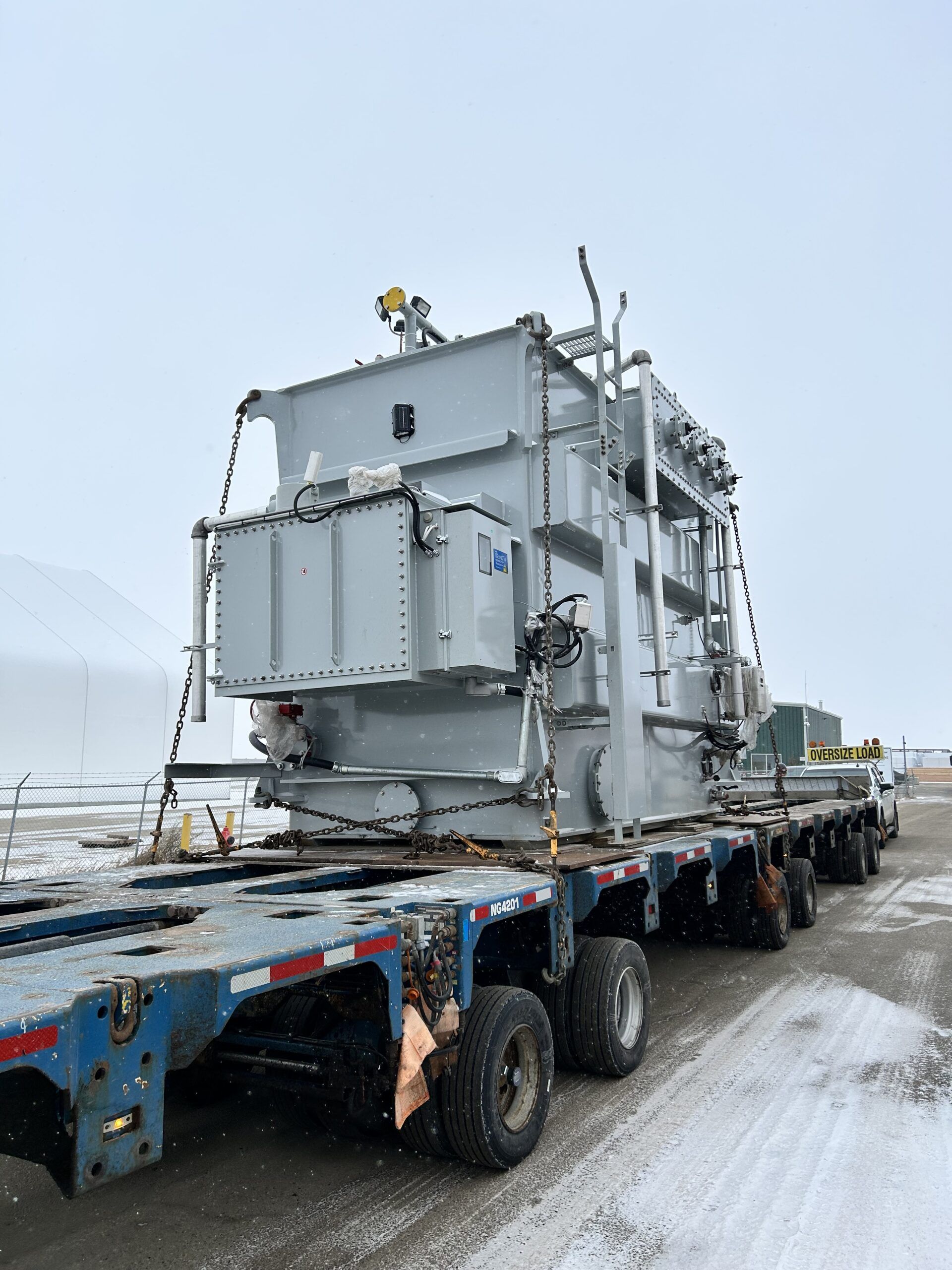 TRANSPORTATION & SECURING 185,000lbs TRANSFORMER TO RAIL - Summit Logistic